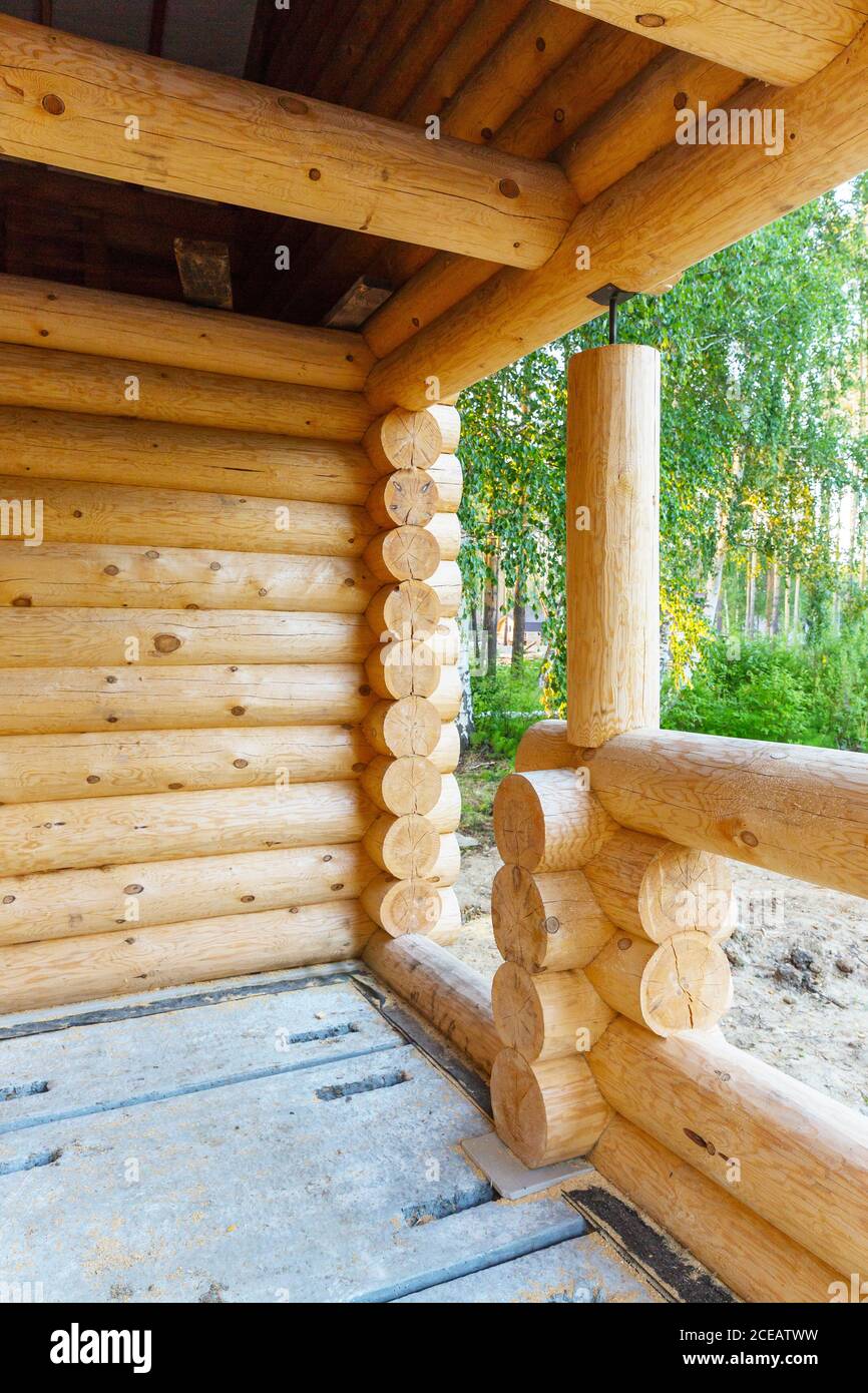 construction of wooden house made of natural logs Stock Photo - Alamy