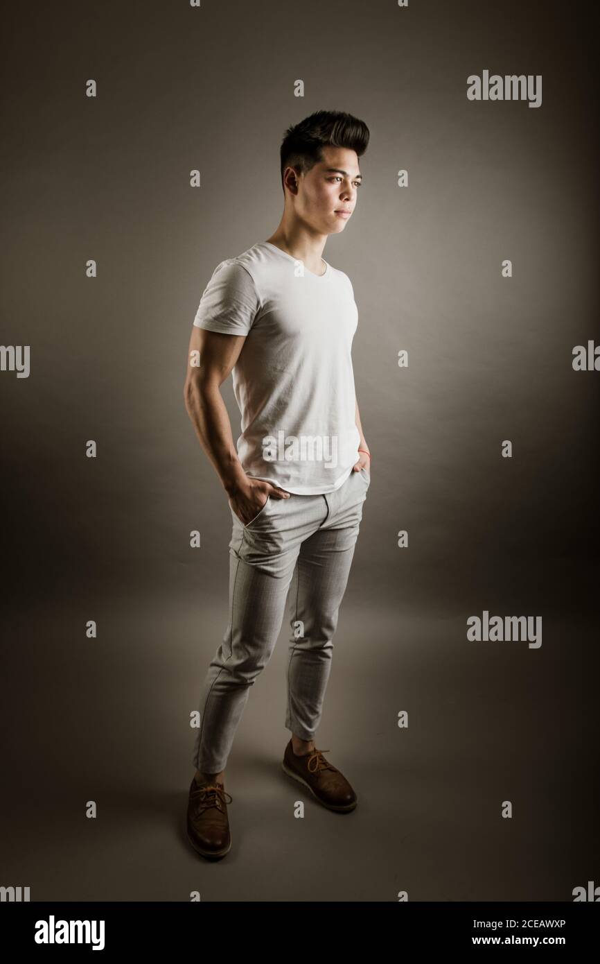 Young male posing in stylish casuals Stock Photo - Alamy