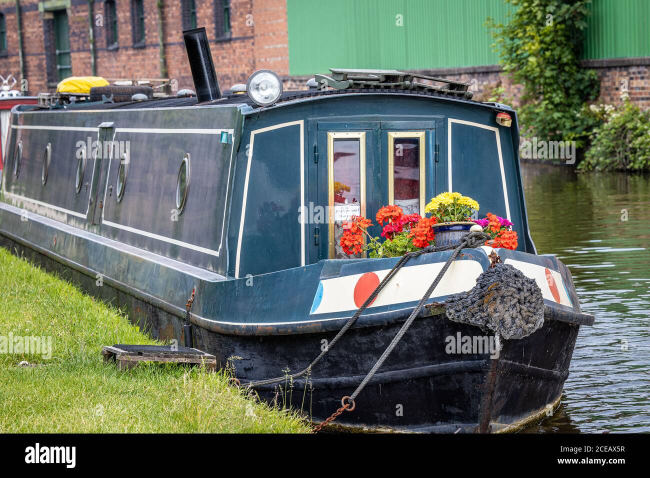 The Trent and Mersey Canal at Sone in Staffordshire with barges and ...
