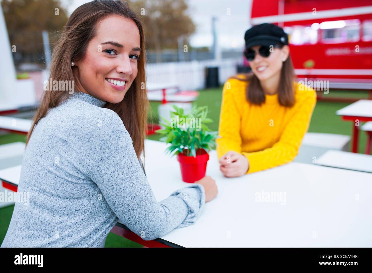 Fashionable young ladies out and about hi-res stock photography and ...