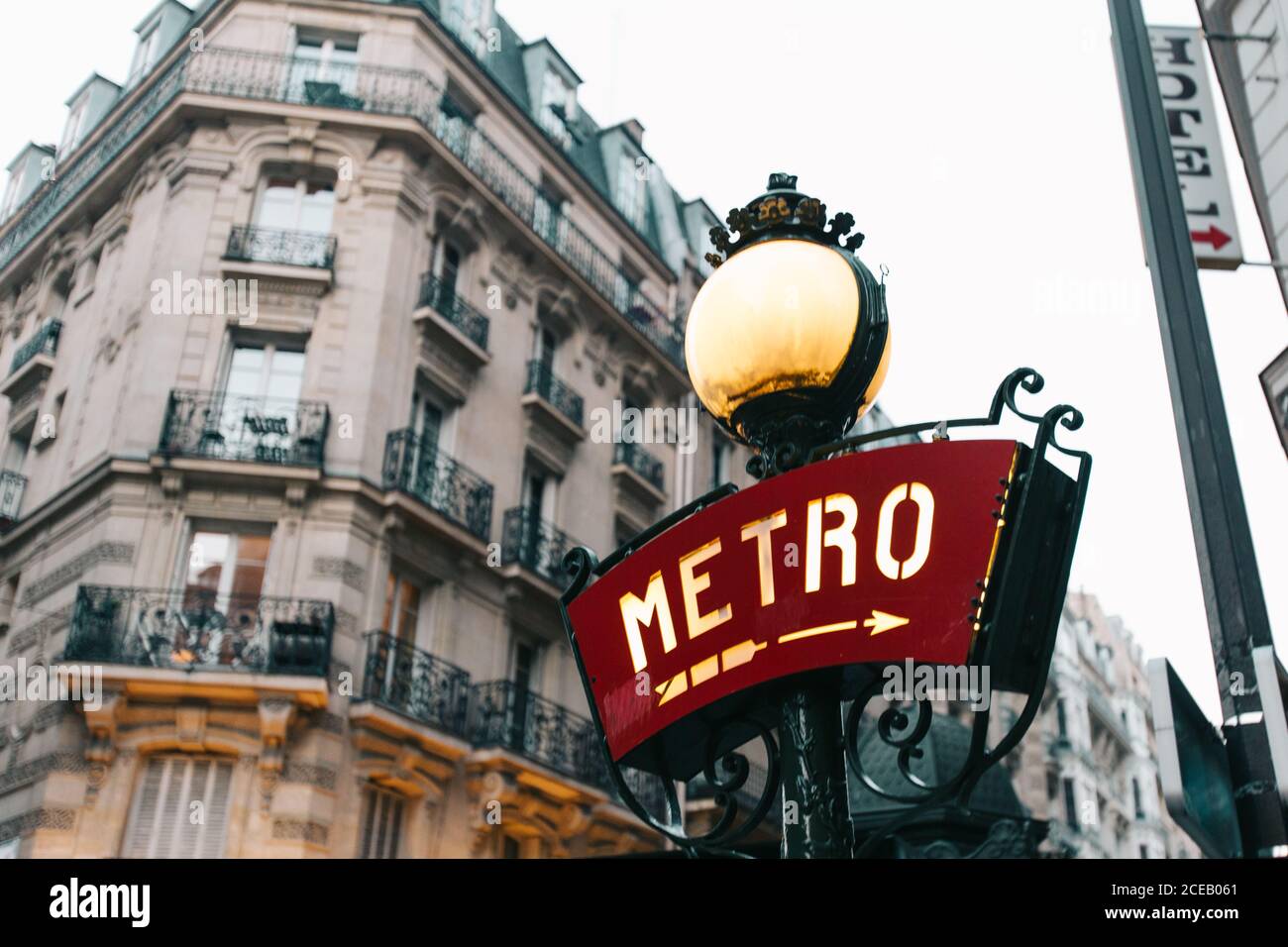 Red metro sign with arrow placed in the Paris city in France Stock ...
