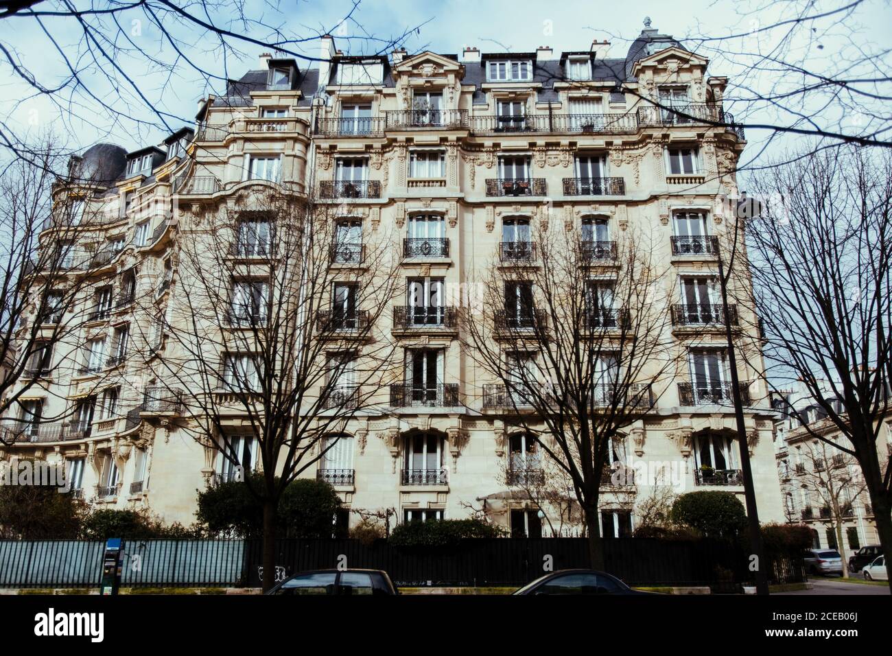 Big traditional house placed on a street in Paris, France Stock Photo ...