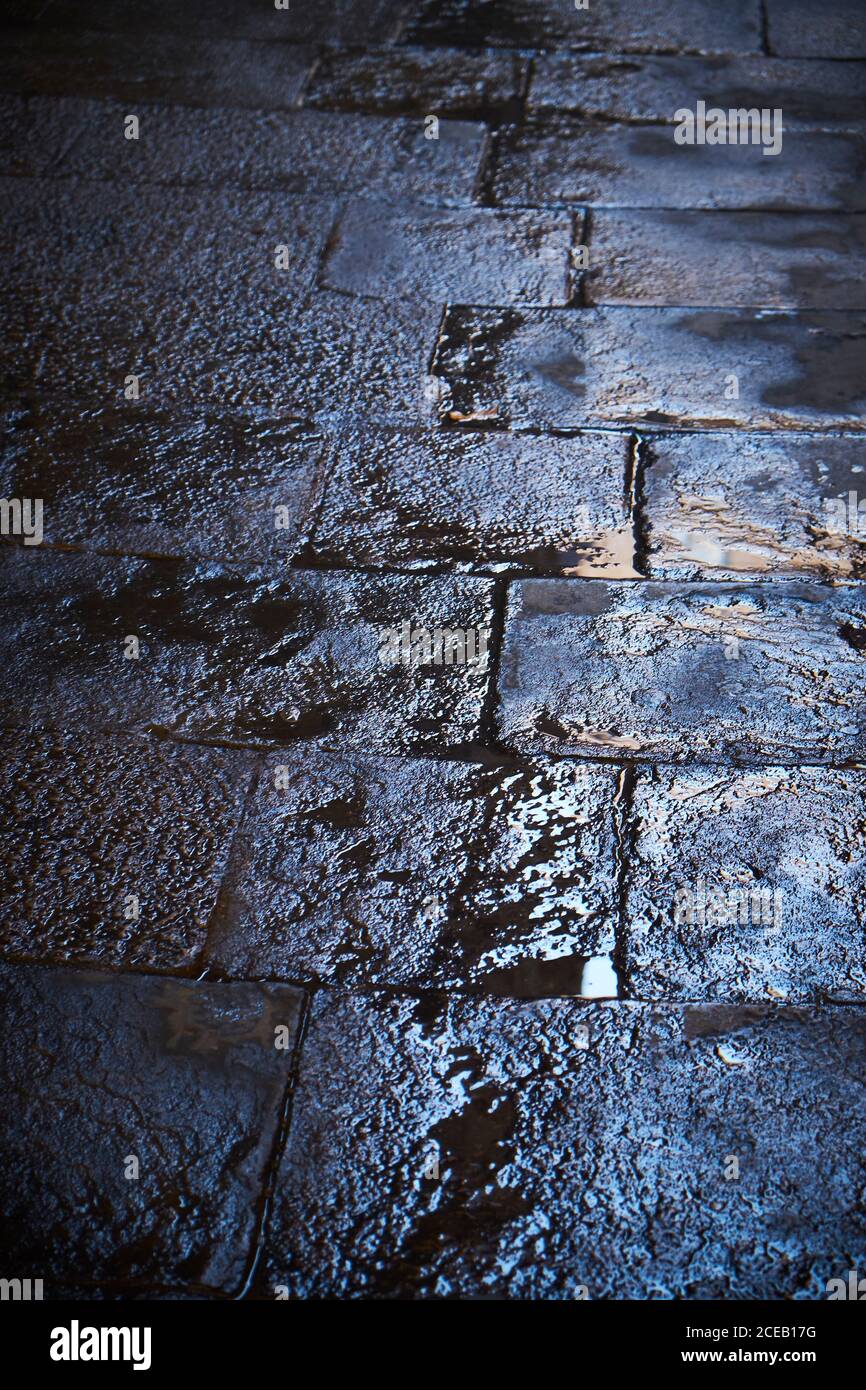 From above view of wet asphalt at darkness of night Stock Photo - Alamy