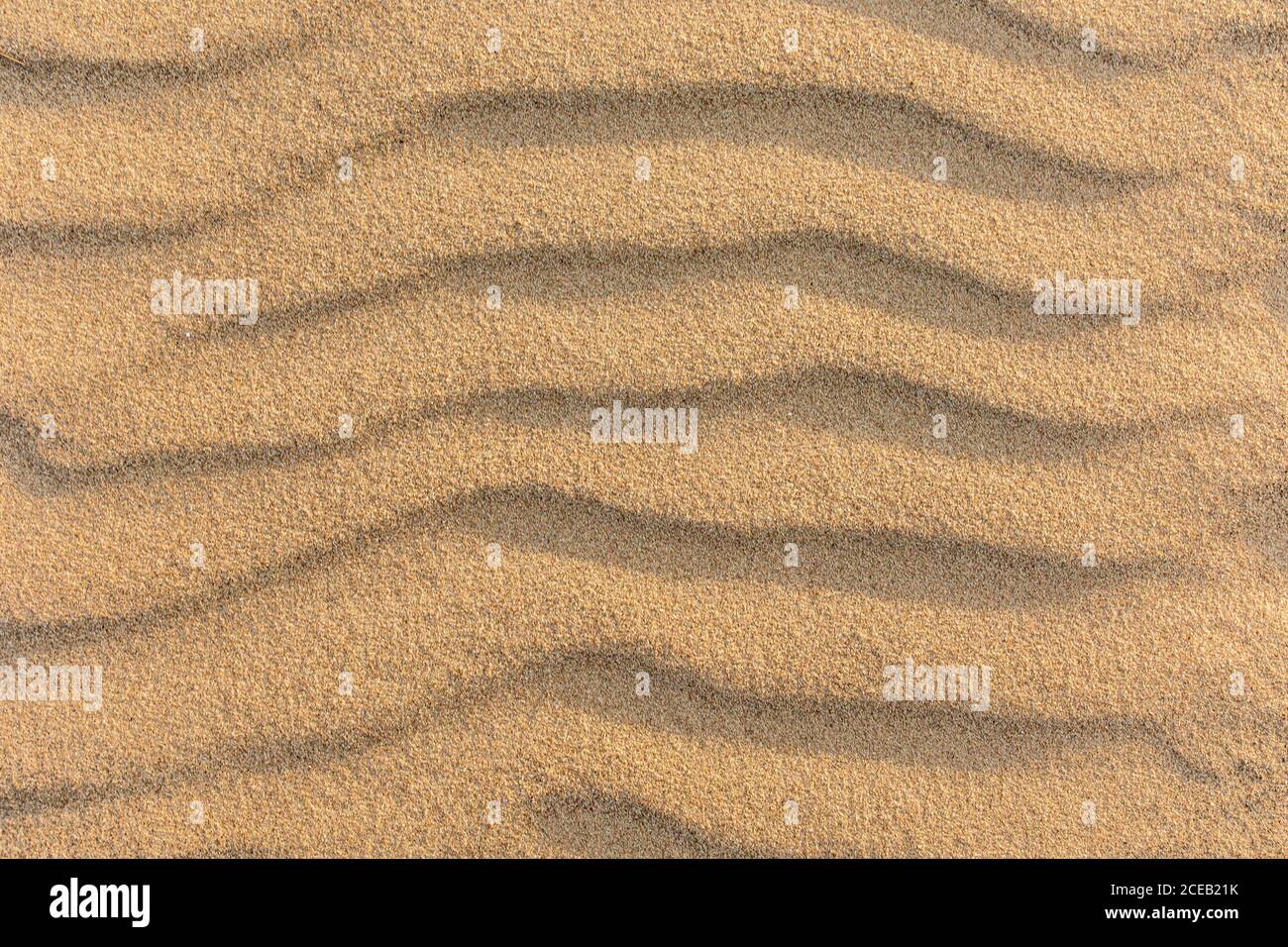 Wavy sea sand background, top view Stock Photo - Alamy