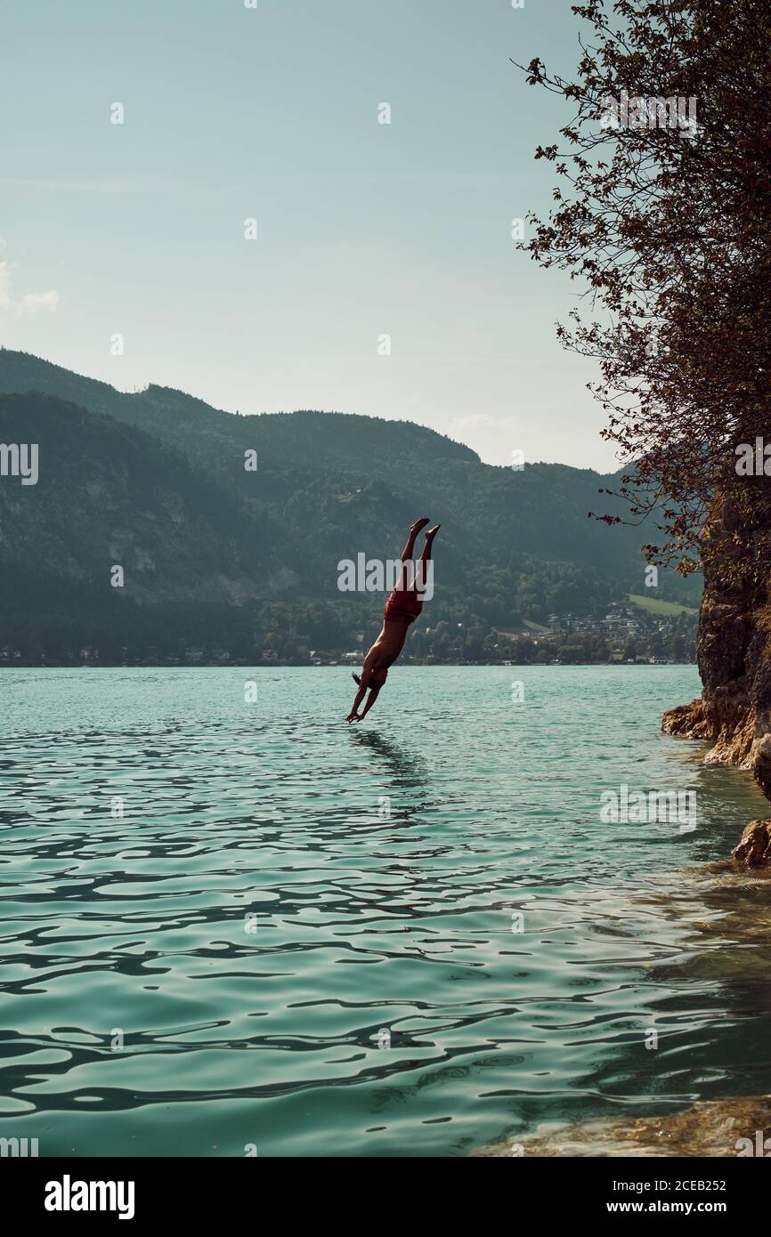 Man jumping water hi-res stock photography and images - Alamy