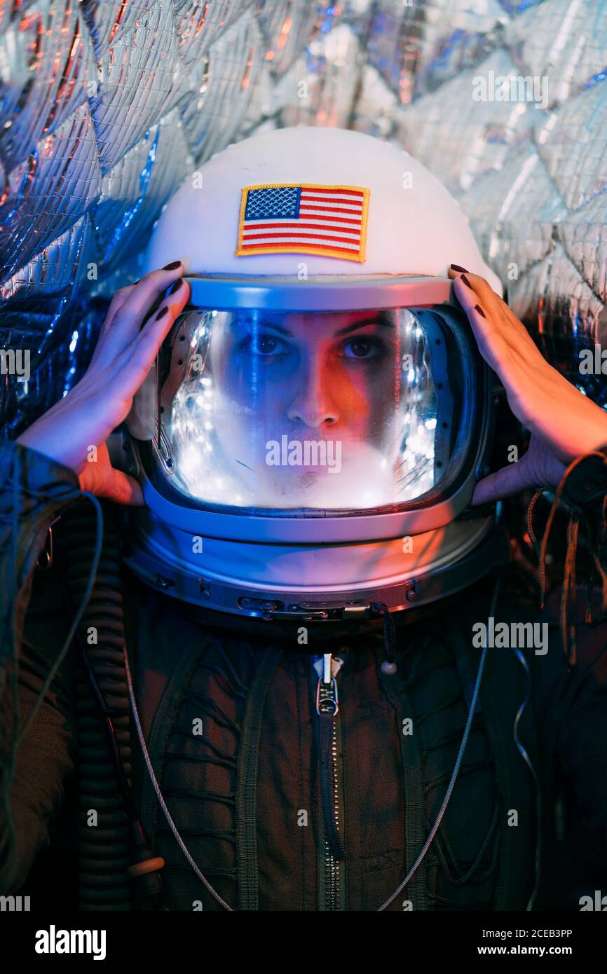 Beautiful Woman poses looking at camera dressed as an astronaut Stock ...