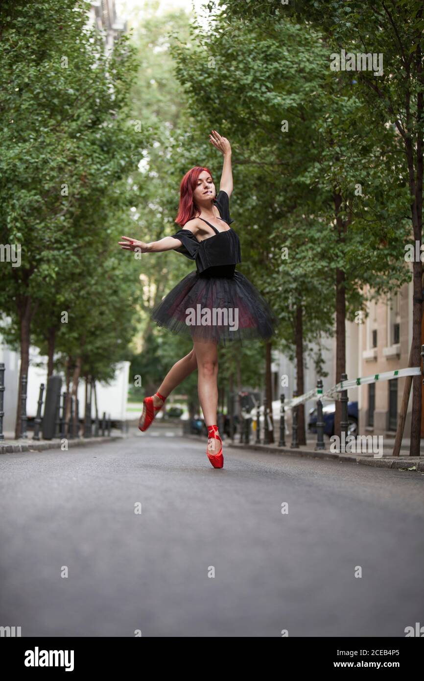 Ballerina in red costume hi-res stock photography and images - Alamy