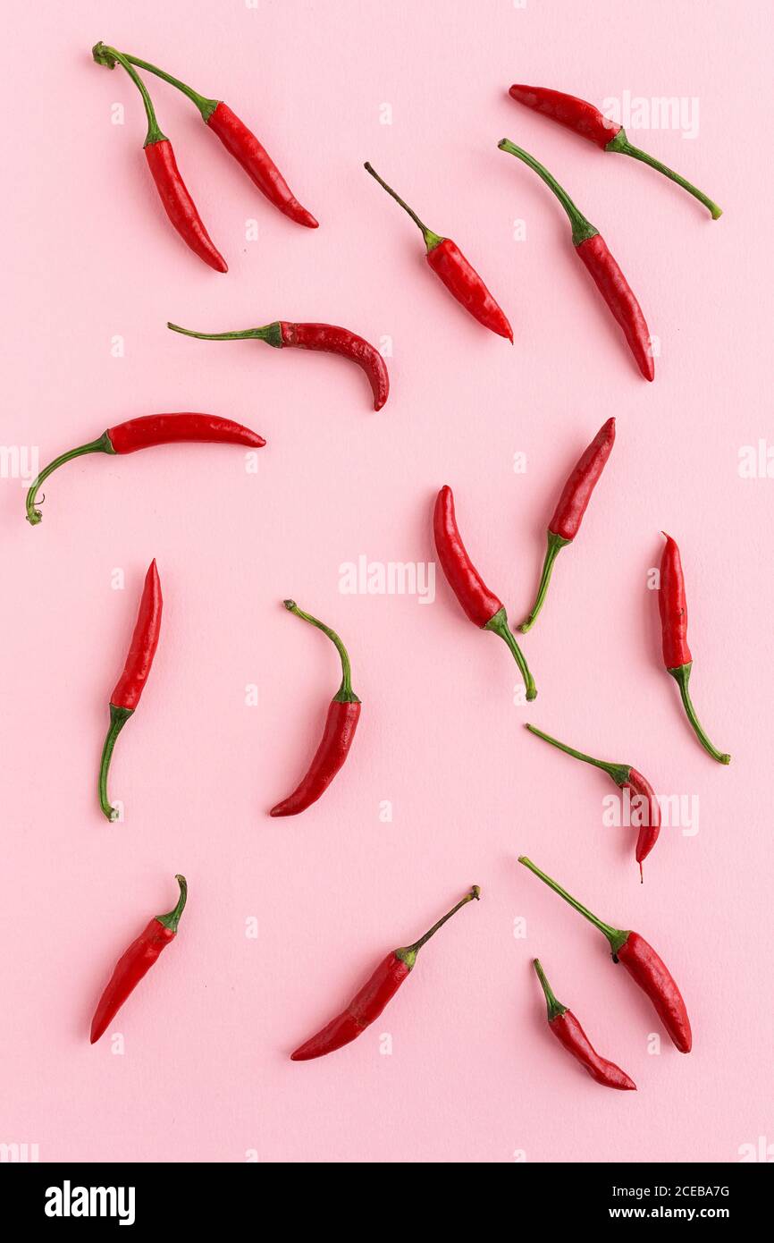 Red peppers on plant hi-res stock photography and images - Alamy