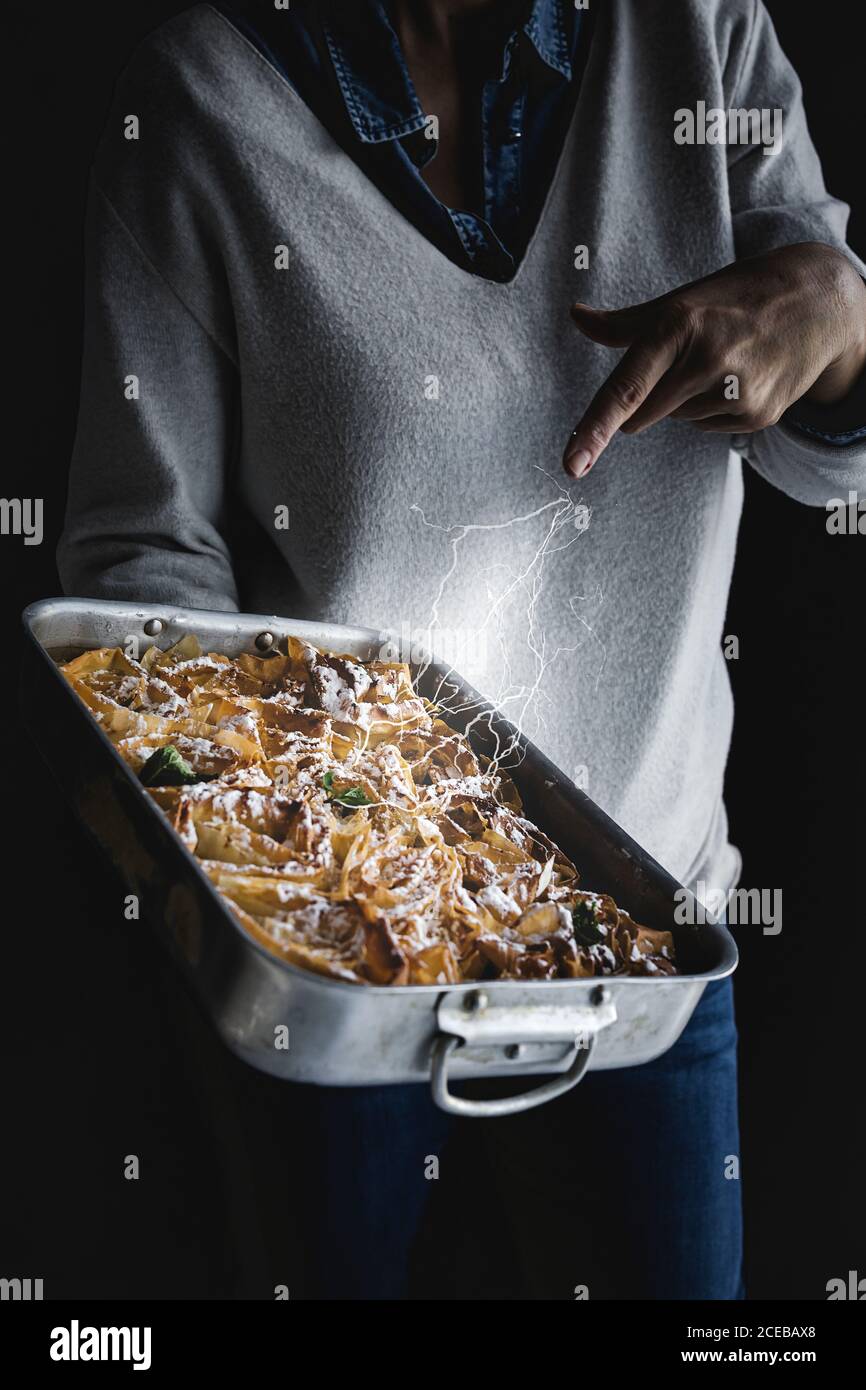 Filo dough with flower shape with hands of unrecognizable Woman doing ...