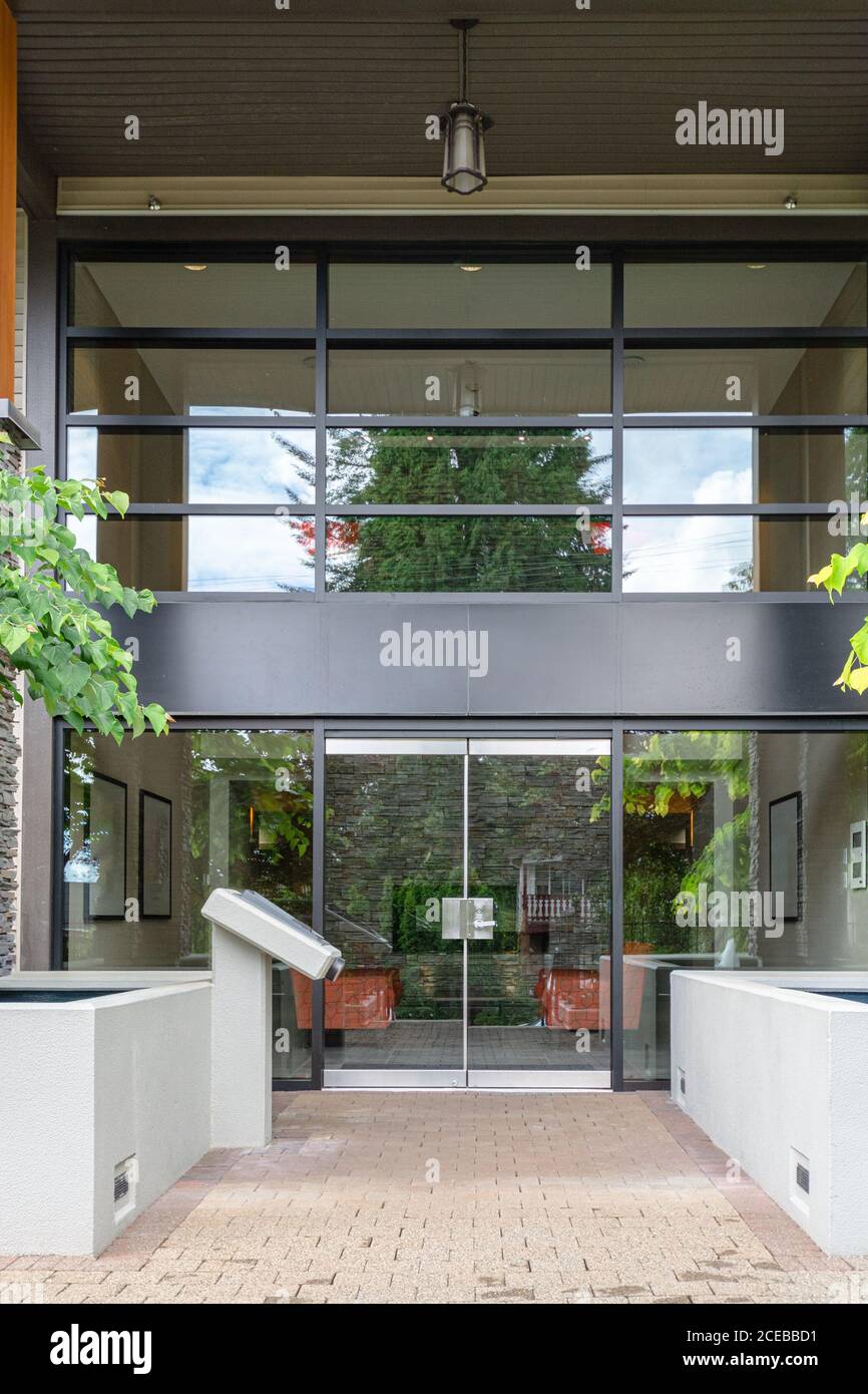 Entrance of new residential building with paved area in front Stock ...