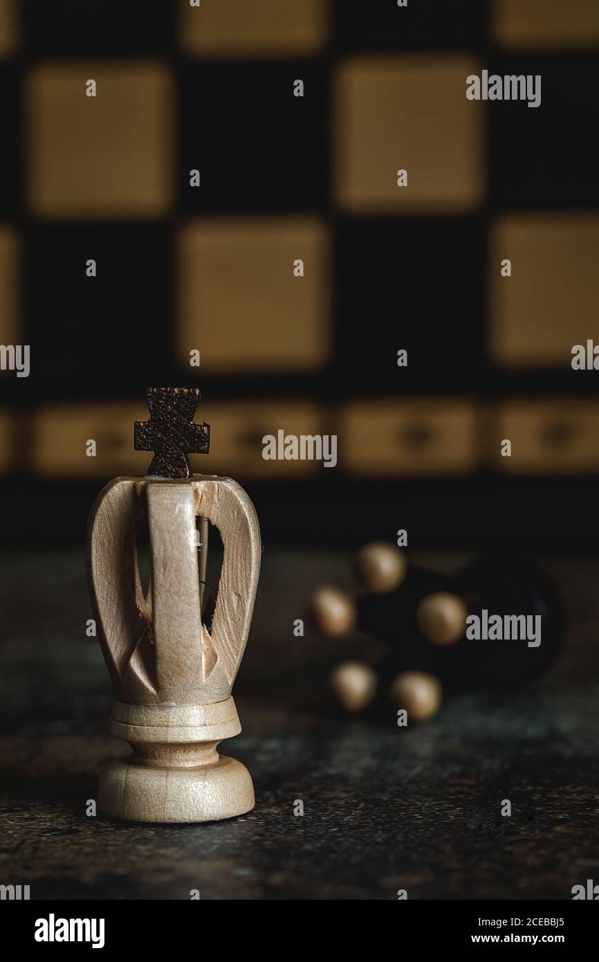 Game and chess pieces on dark background. close up.Details Stock Photo ...