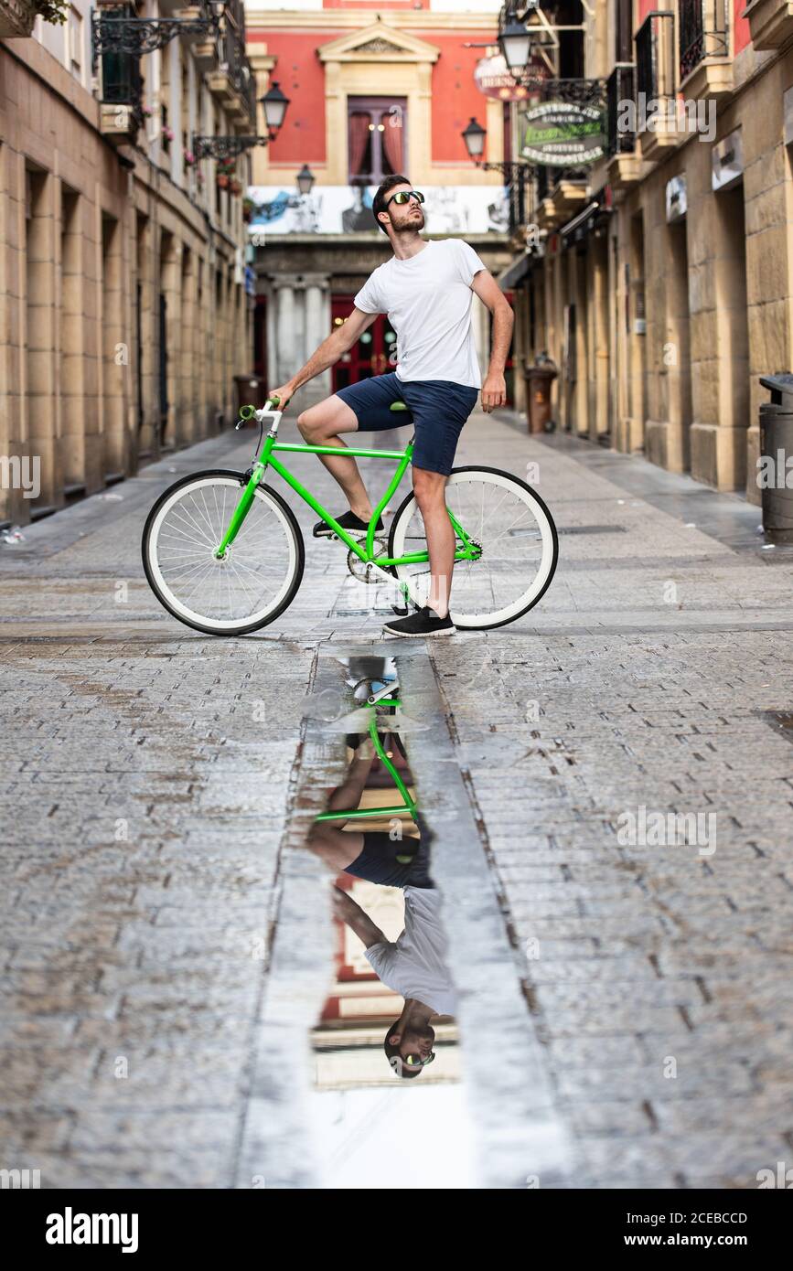 Man standing in green hi-res stock photography and images - Alamy