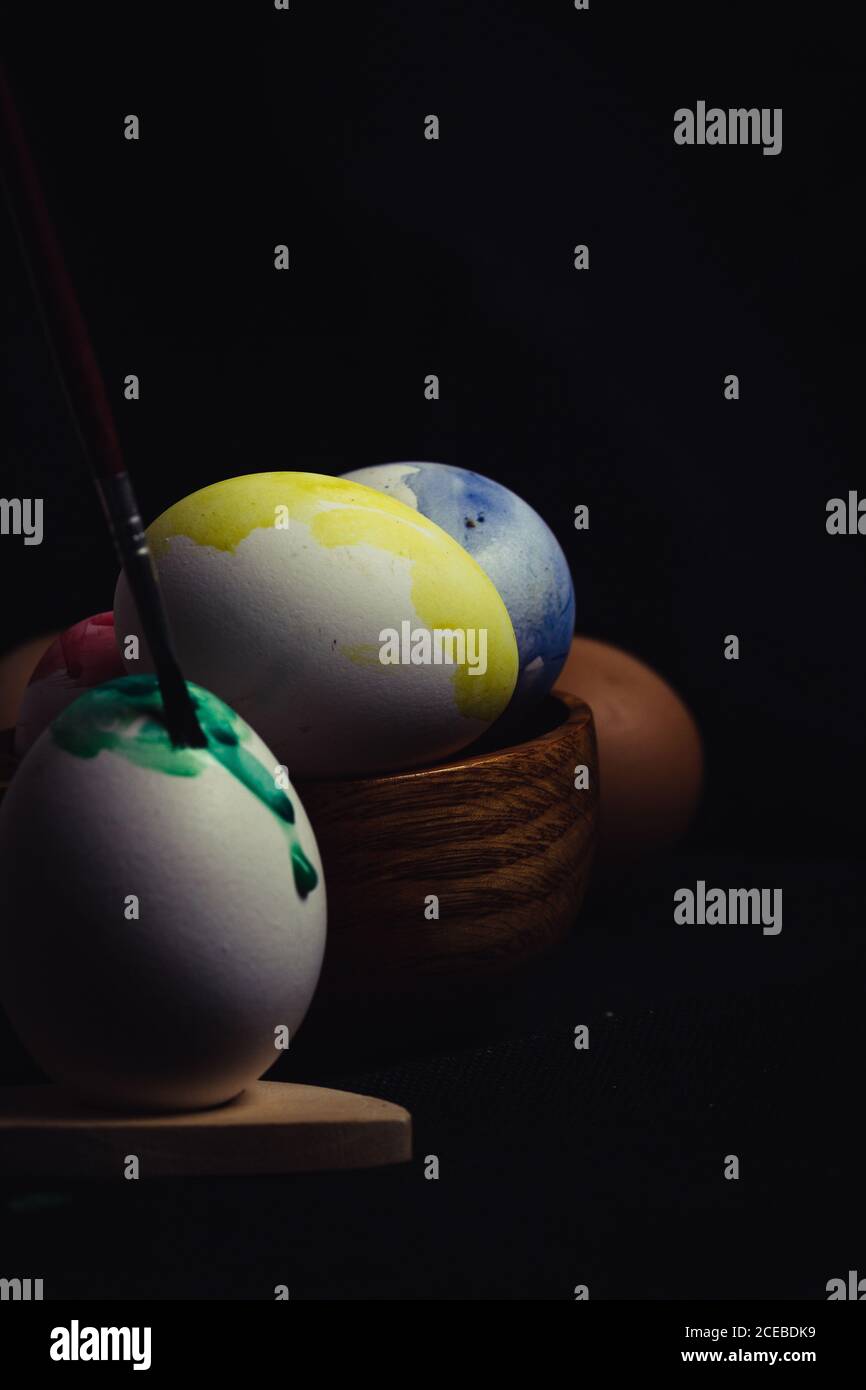 Crop hand painting Easter egg Stock Photo - Alamy
