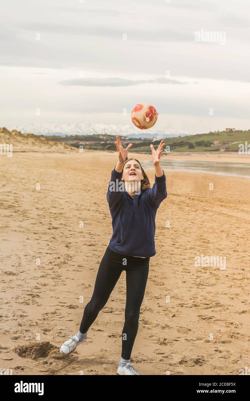 Girl catch ball hi-res stock photography and images - Alamy