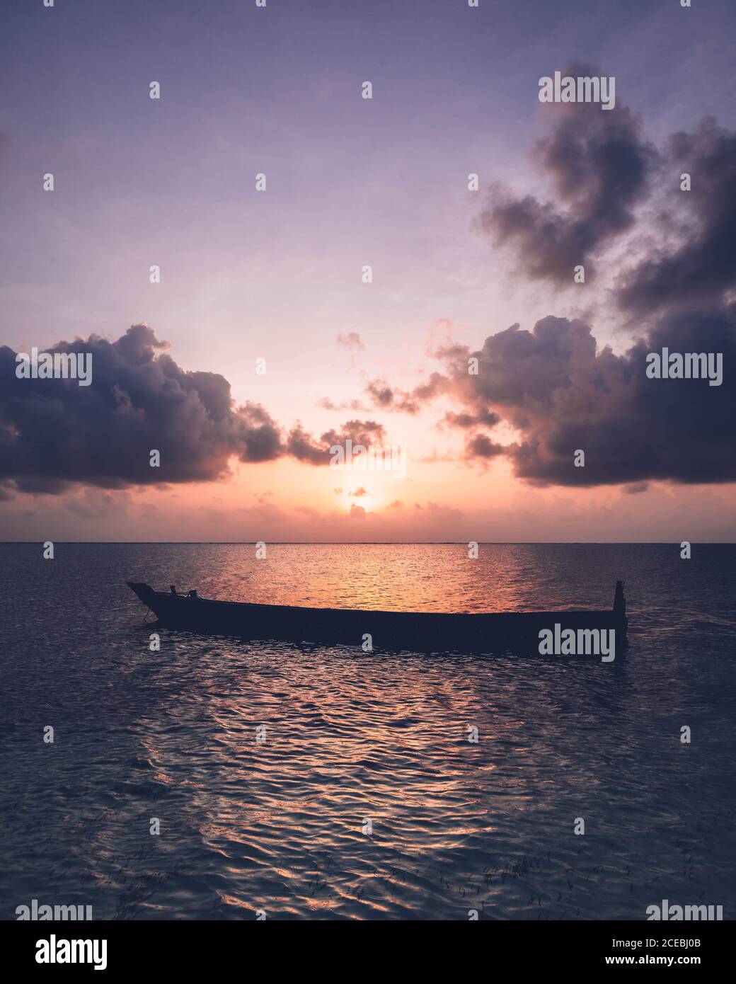 Empty boat floating in the water hi-res stock photography and images ...