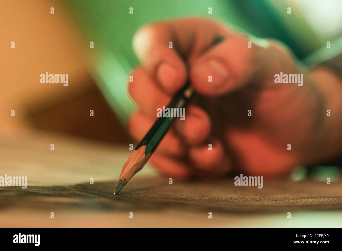 Close-up hand of unrecognizable person drawing with pencil Stock Photo ...
