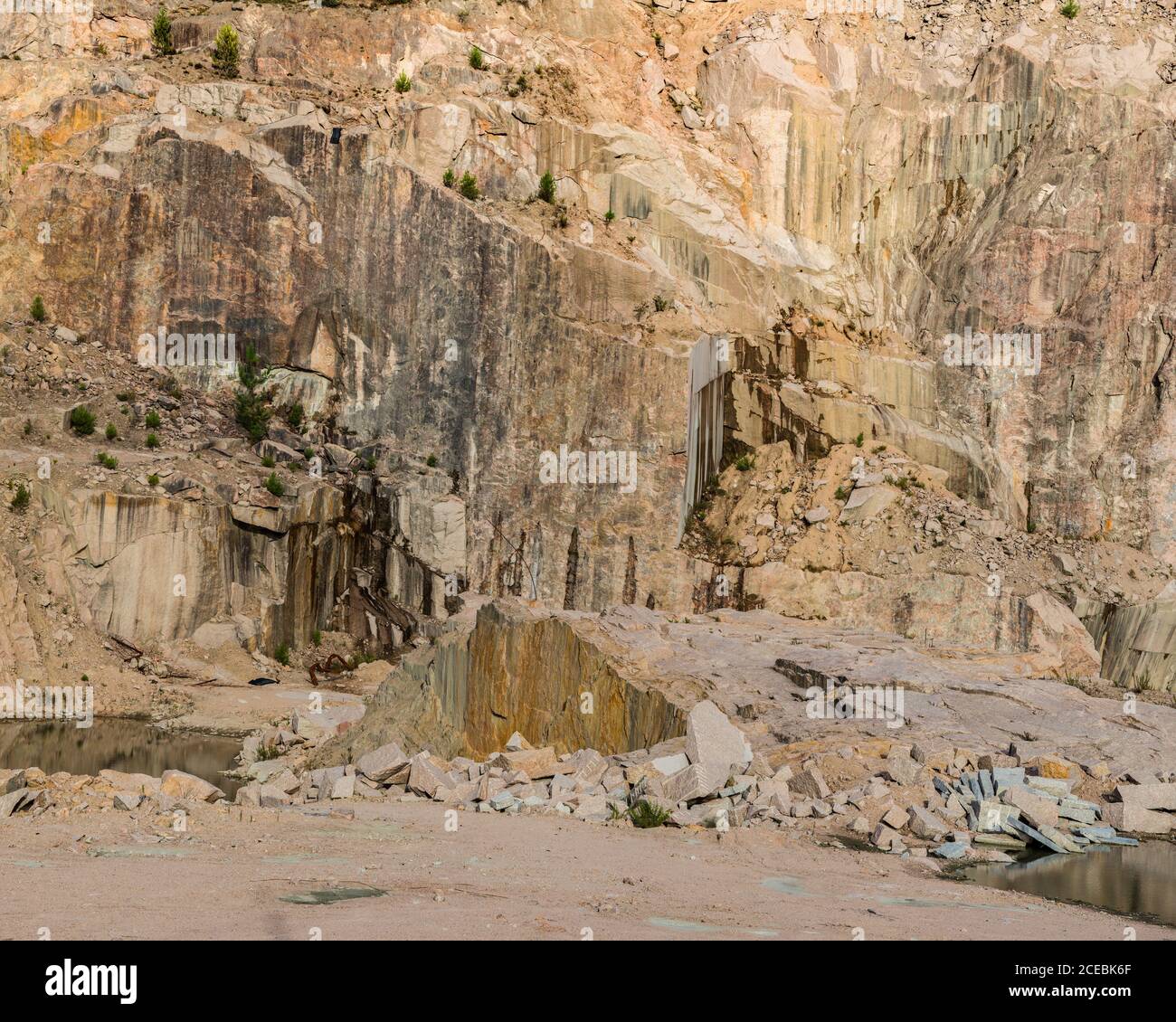 Surface of smooth quarry wall Stock Photo - Alamy