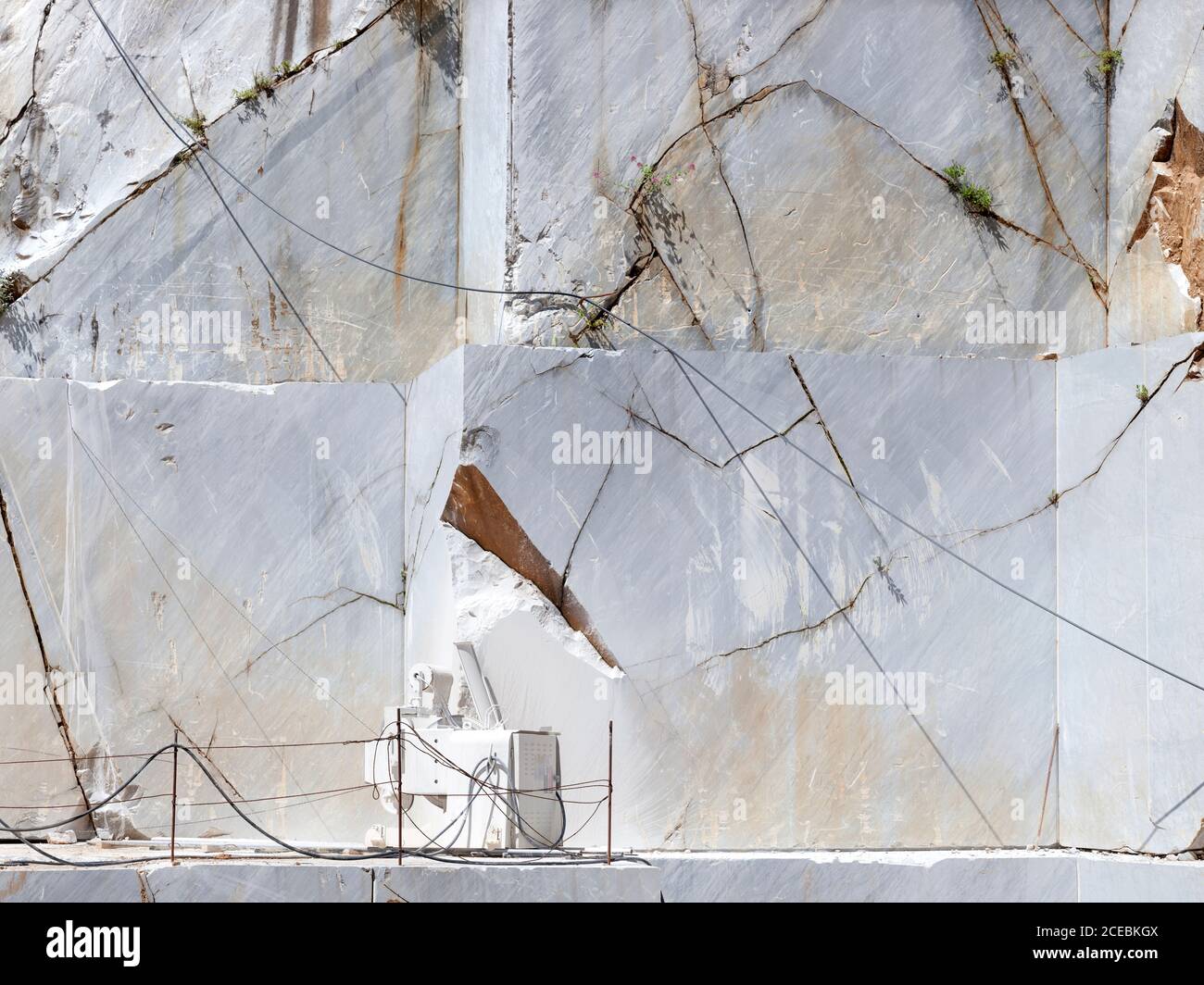 Huge marble blocks lying on ground on sunny day in quarry Stock Photo ...