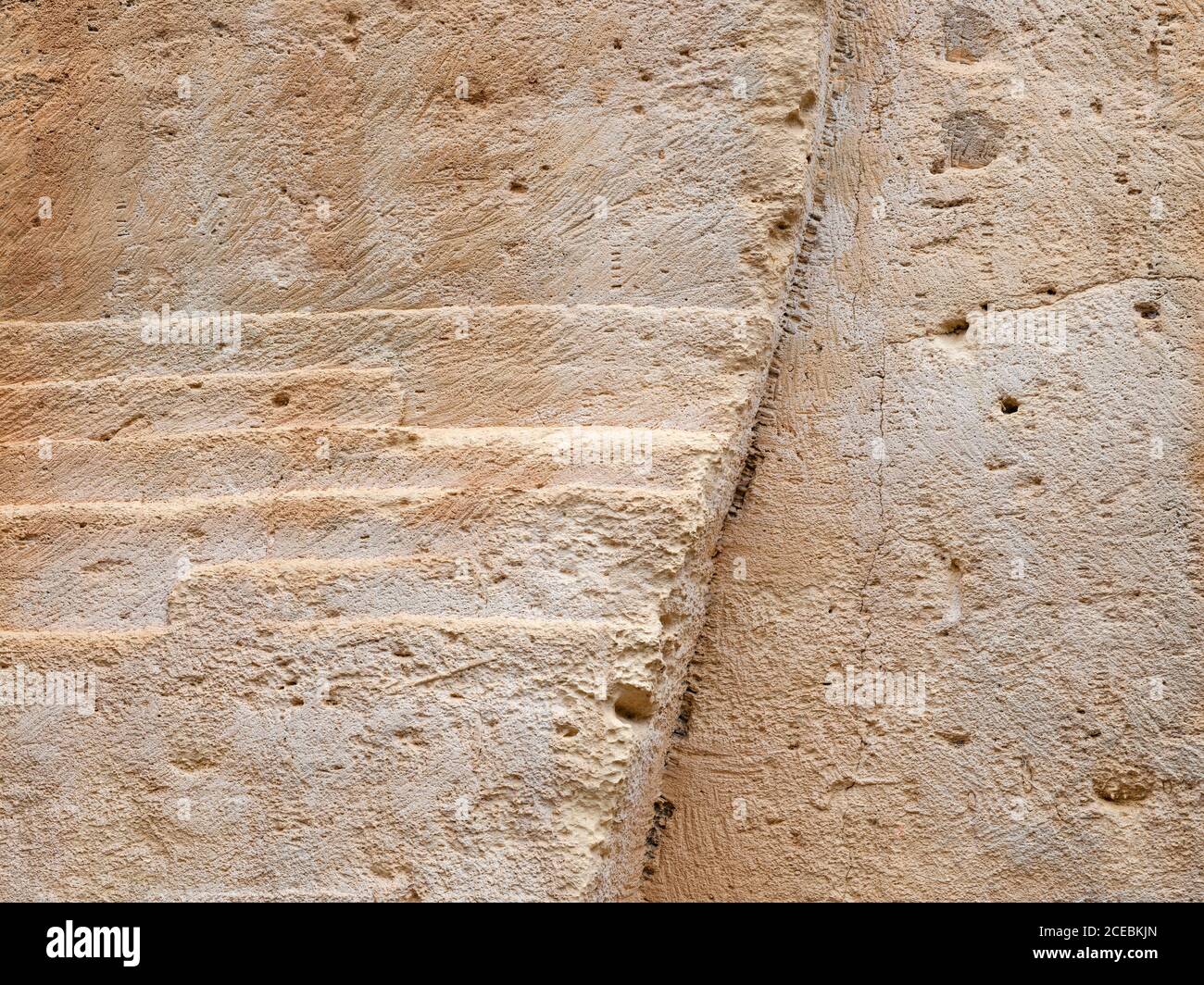 Rough wall of stone quarry Stock Photo - Alamy