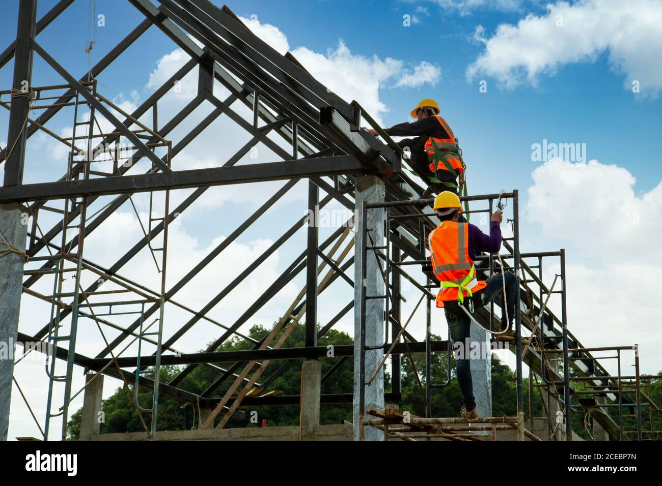 Asian worker wear safety height equipment to install the roof. Fall ...