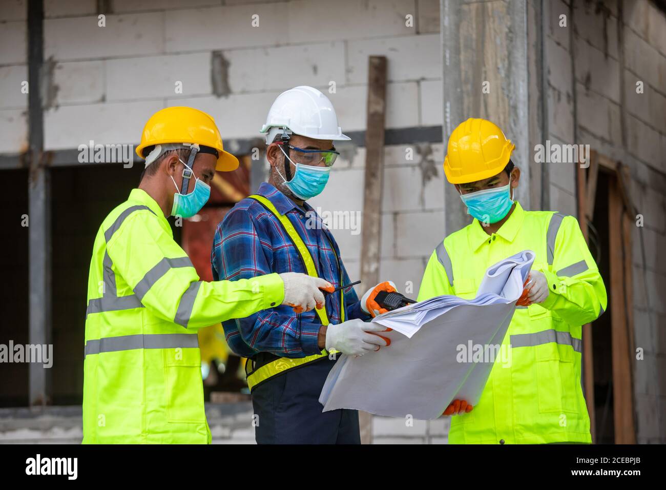 Asian engineer technician team introduction of workers to build a house ...