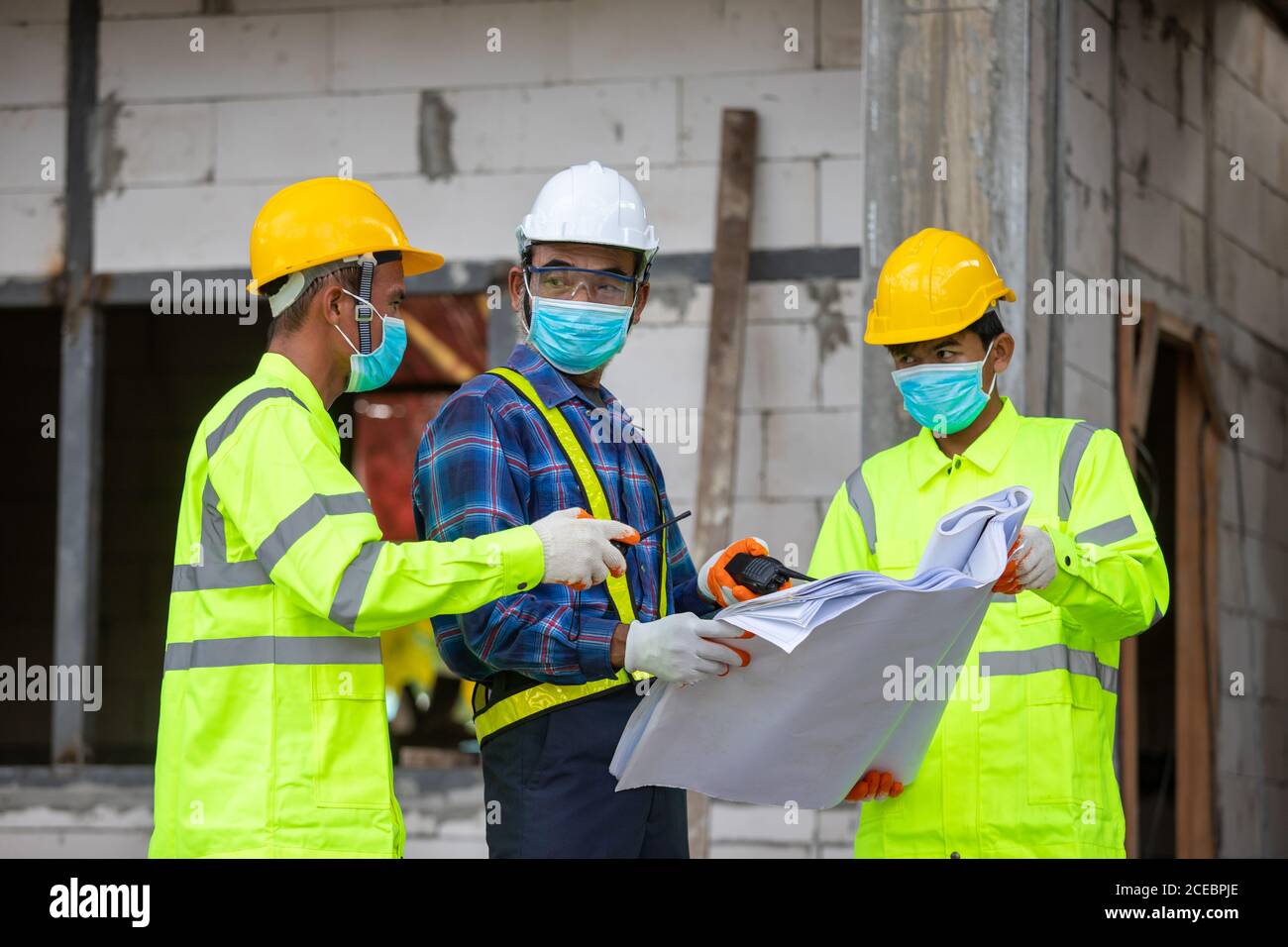 Asian engineer technician team introduction of workers to build a house ...