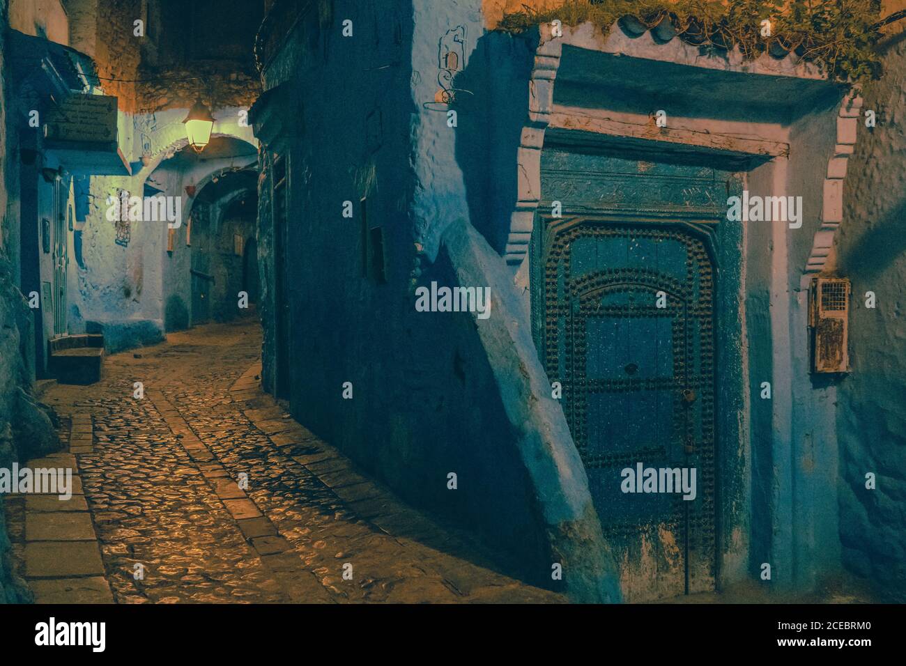 Amazing view of poor street between ancient houses in evening in ...