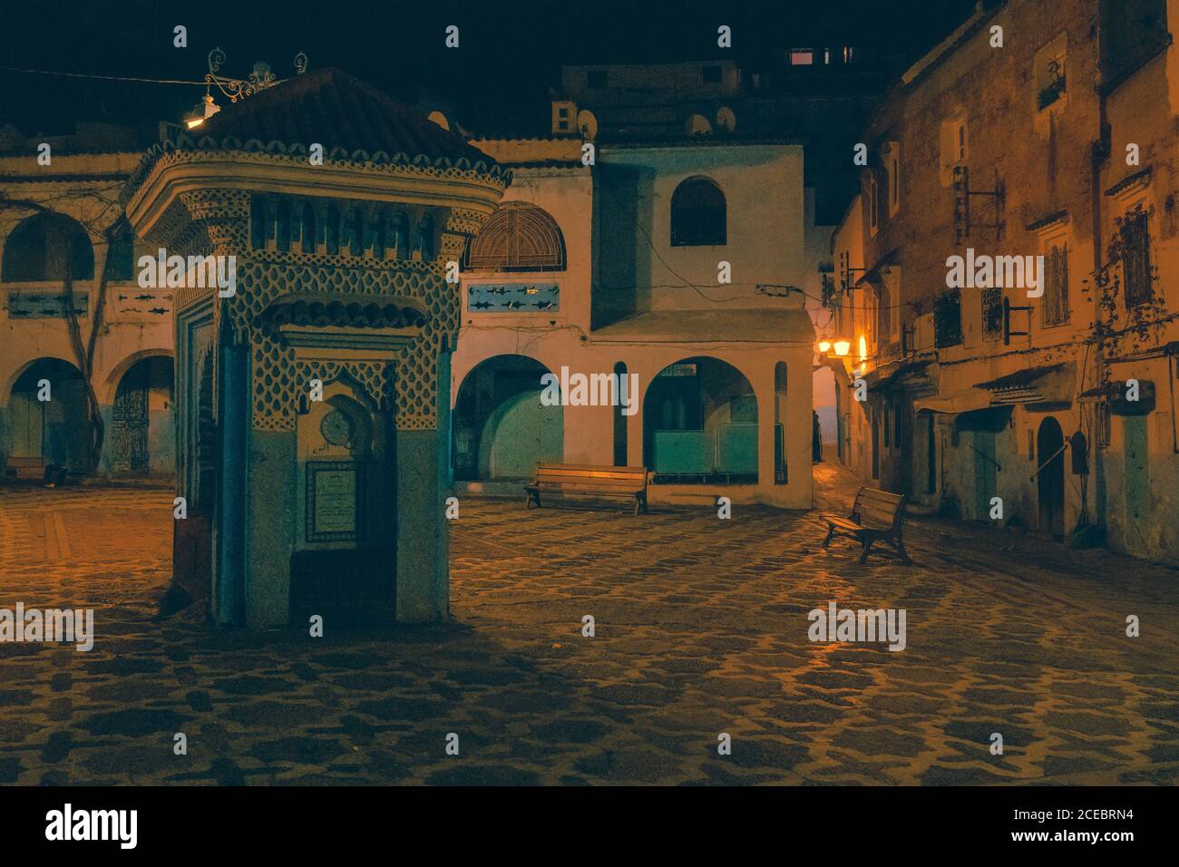 Amazing view of poor street between ancient houses in evening in ...