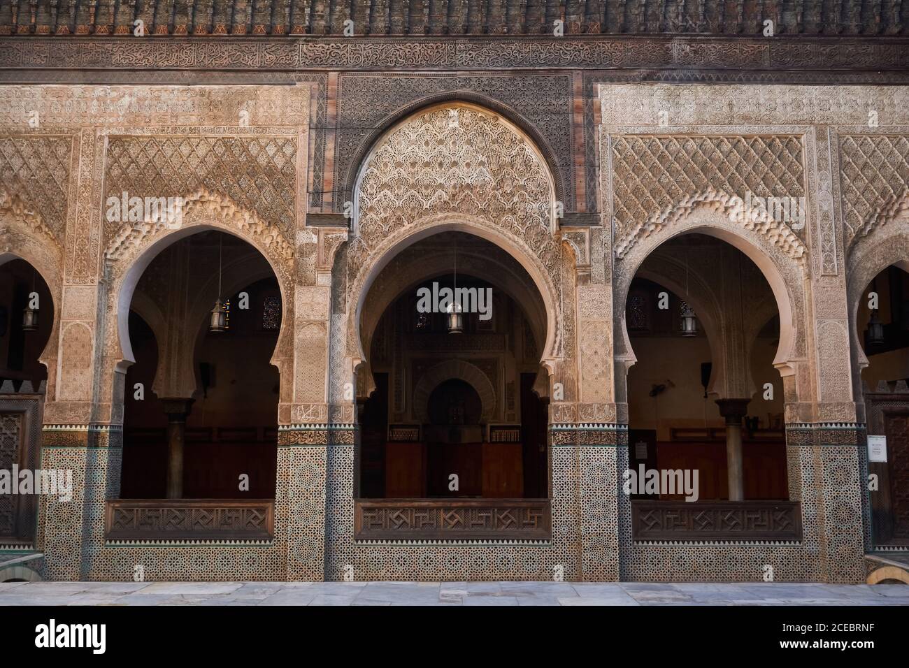Facade of old stone building with vintage doors in Marrakesh, Morocco ...