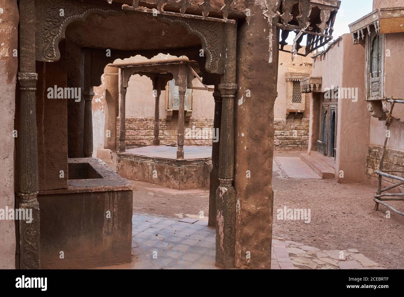 Amazing view of poor street between ancient houses in Marrakesh ...