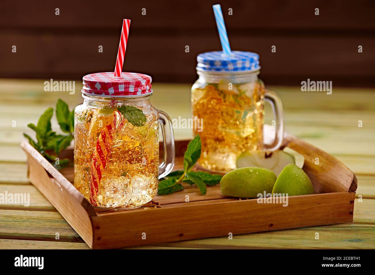 Wooden tray with served refreshing lemonade Stock Photo - Alamy
