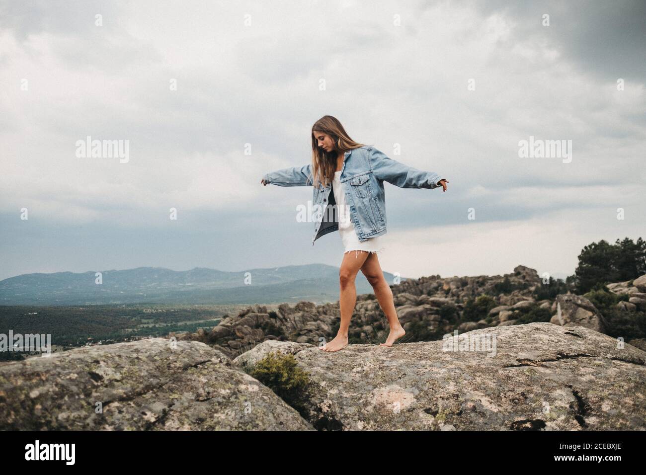 Jumping over rocks hi-res stock photography and images - Alamy