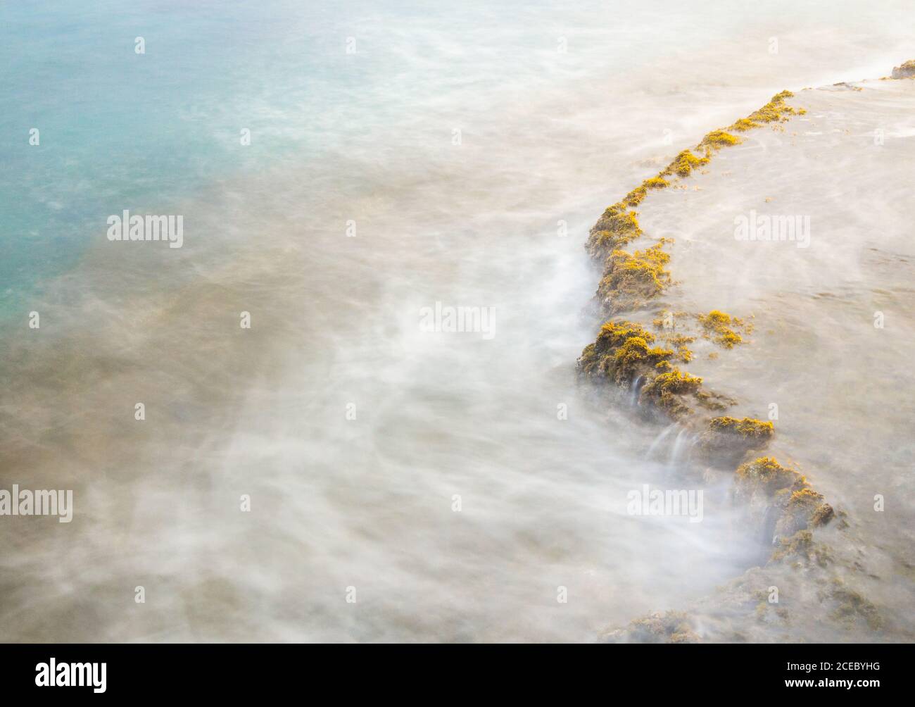 Bright morning sun rising over surface of clean sea water in majestic ...