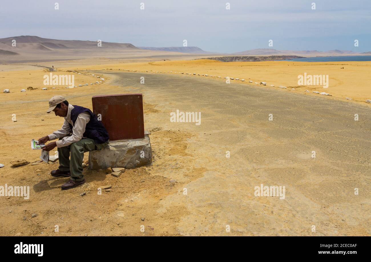 Peru - January, 02 2012: side view of poor man in shabby clothes ...