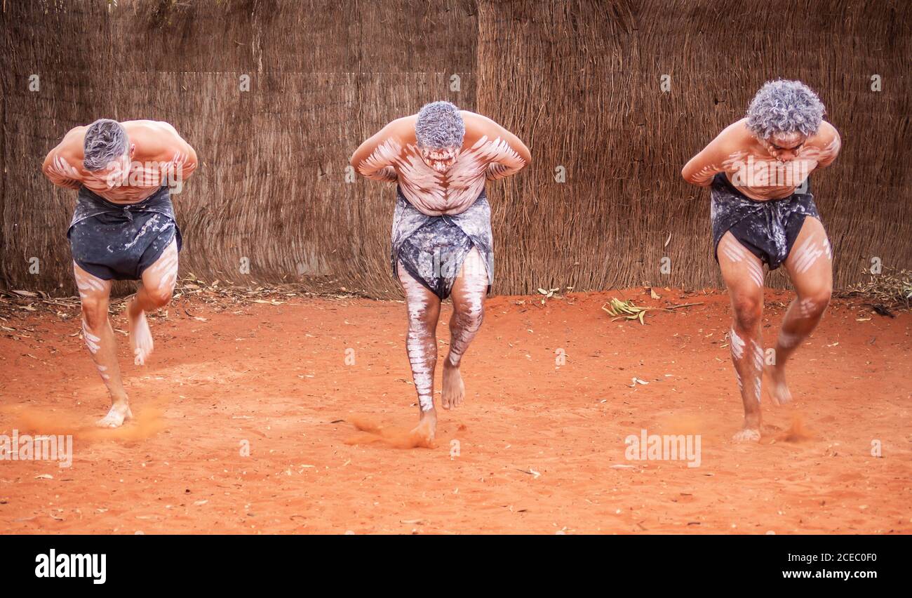 Uluru Outback, Australia - March, 09 2015: Three male aborigines with ...