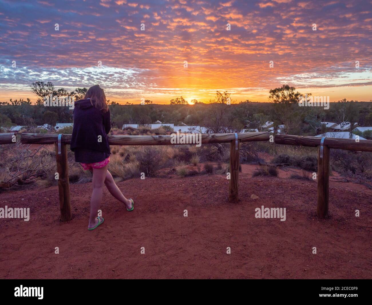 Uluru Outback, Australia - March, 08 2015: Back view of female in ...