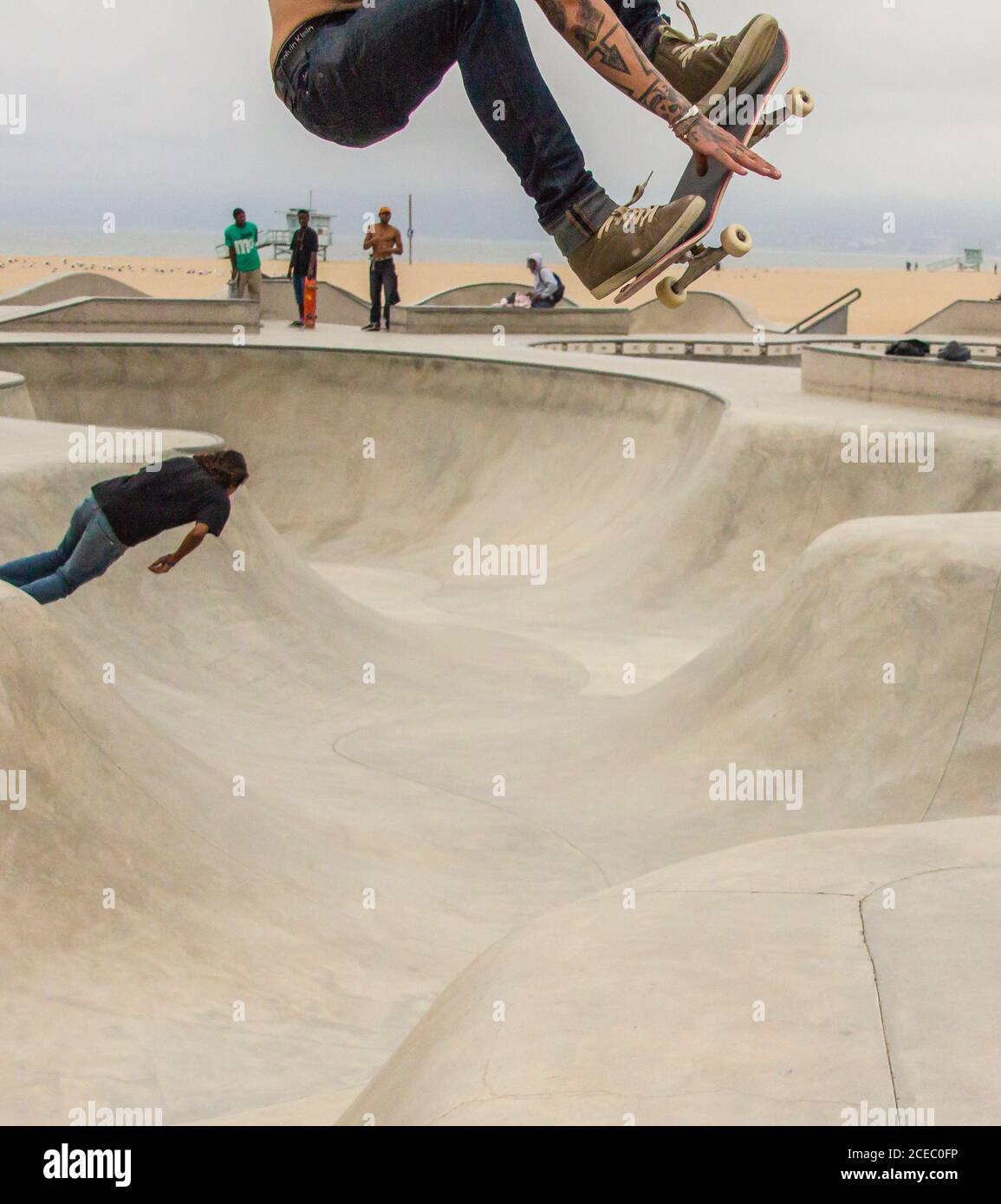 Young people performing tricks riding hi-res stock photography and ...
