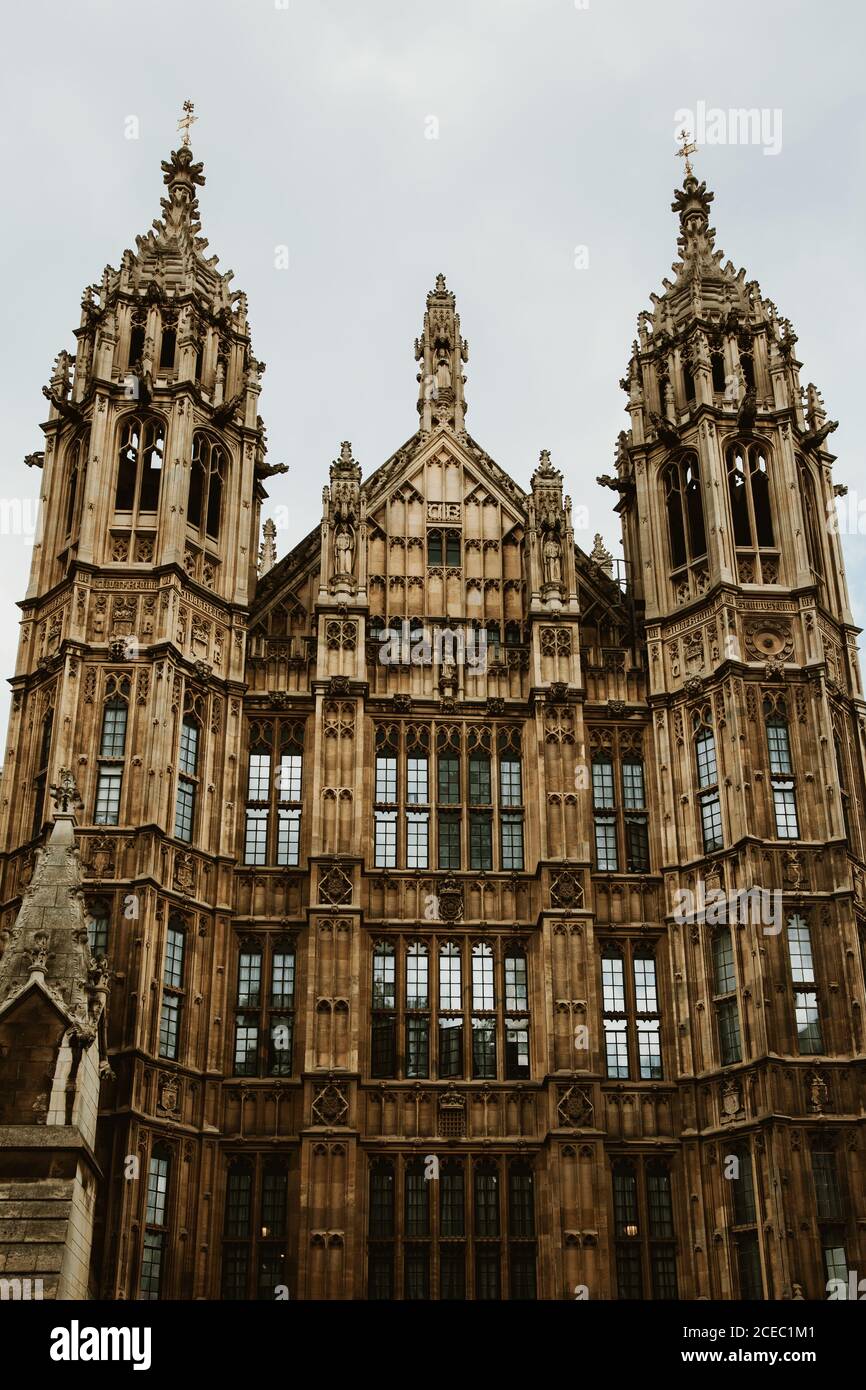 Magnificent view of facade of old building decorated with many ...