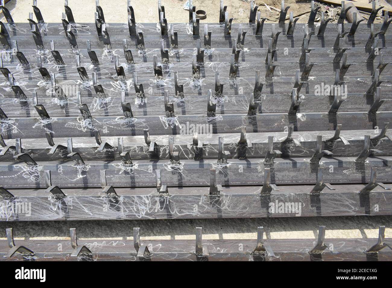 Steel angles with hundreds of support cleat Stock Photo - Alamy