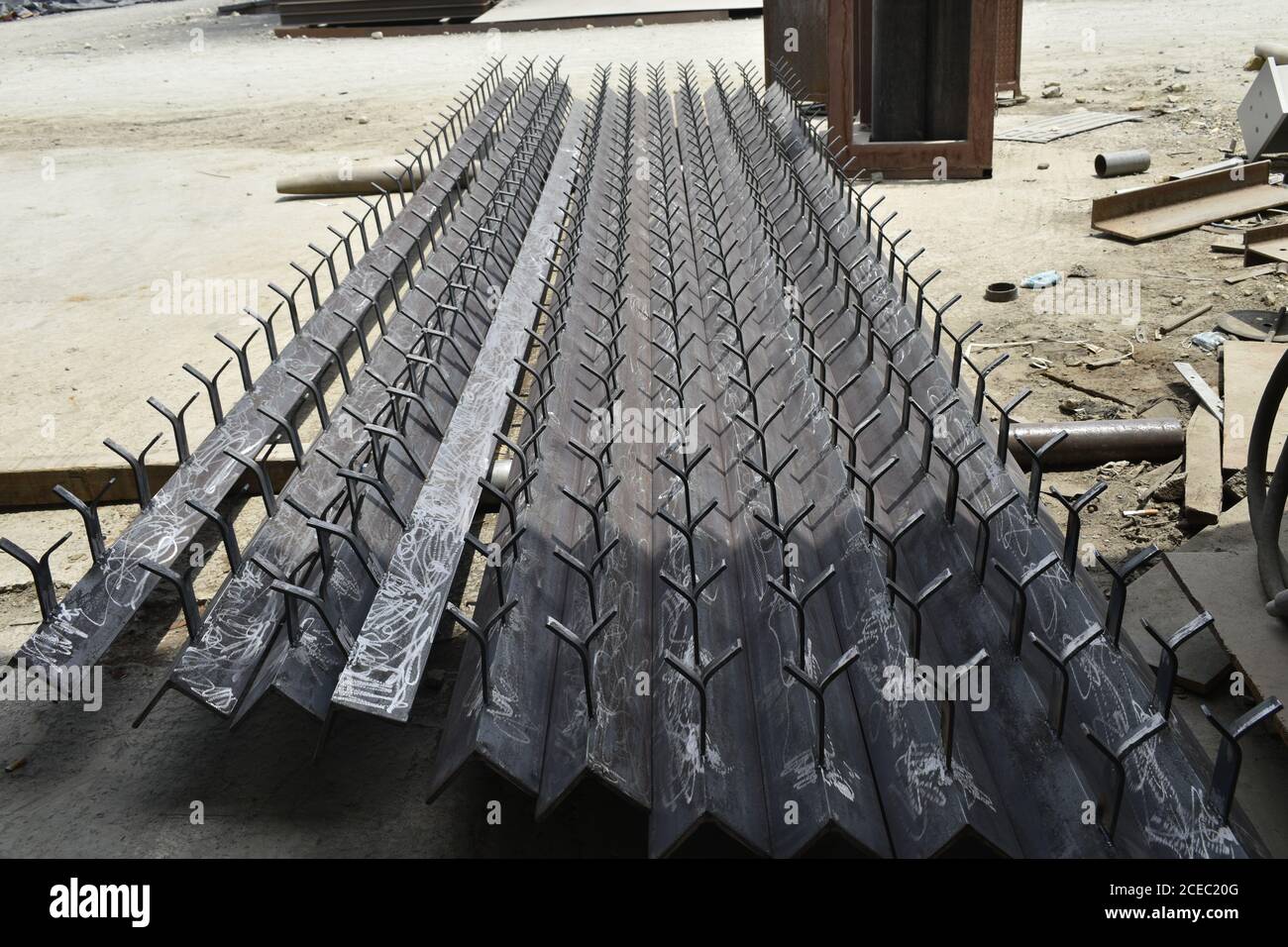 Steel angles with hundreds of support cleat Stock Photo - Alamy