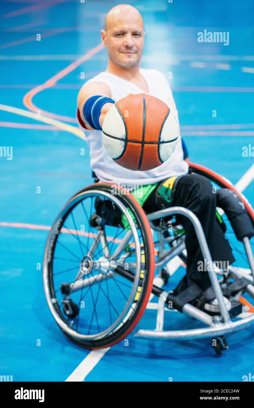 Disabled sport men in action while playing indoor basketball Stock ...