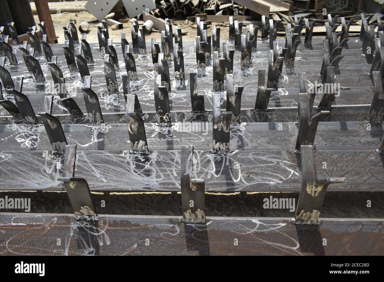 Steel angles with hundreds of support cleat Stock Photo - Alamy