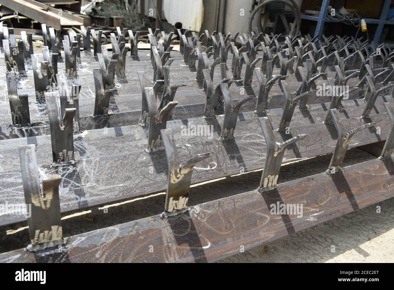Steel angles with hundreds of support cleat Stock Photo - Alamy