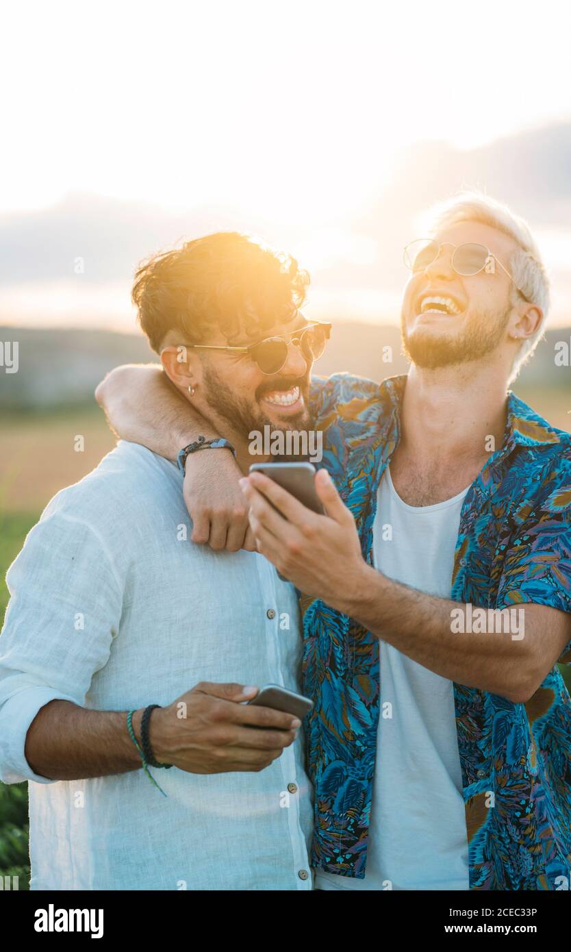 Hugging two men hi-res stock photography and images - Alamy
