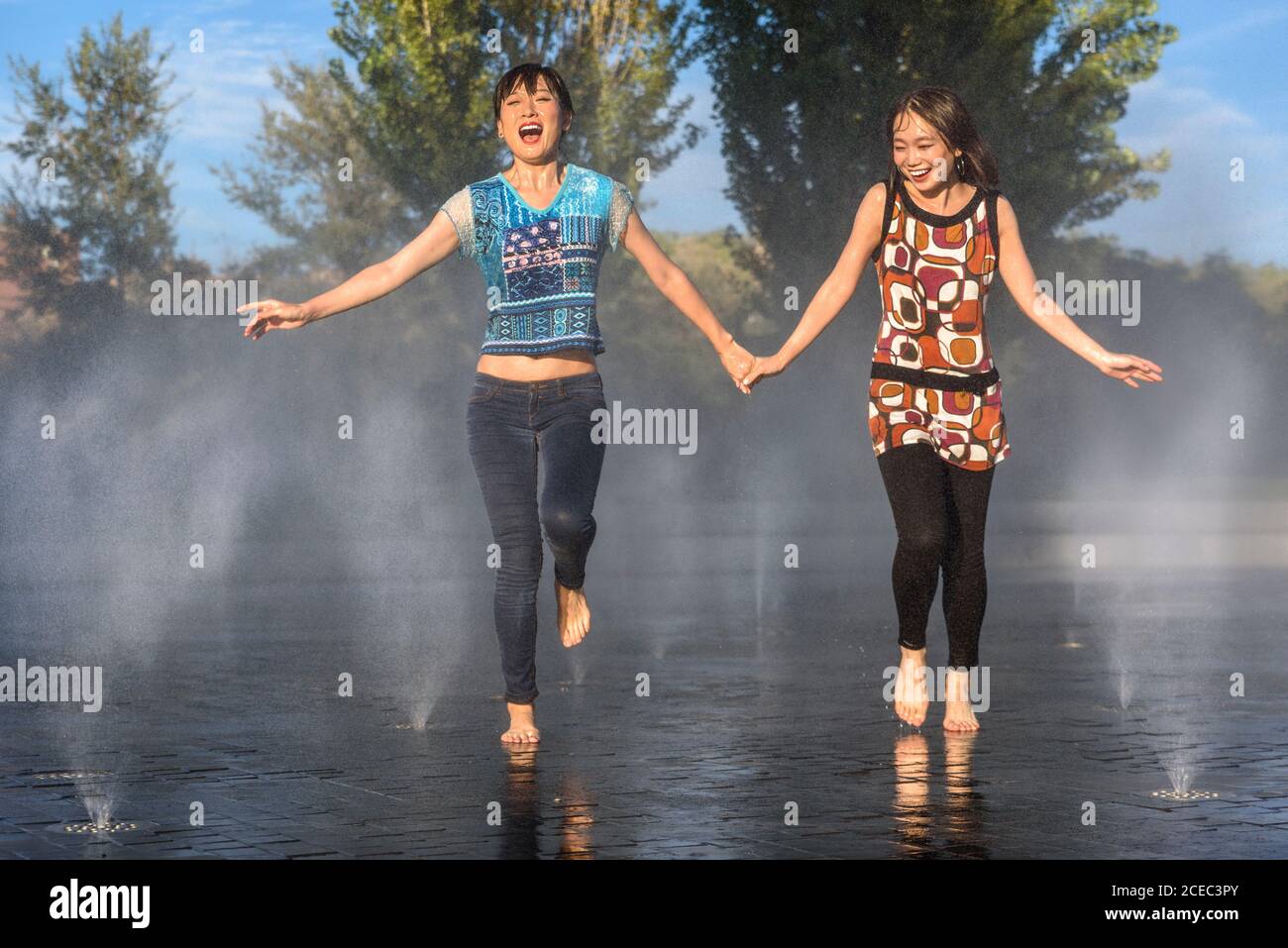 Japanese women jumping for hi-res stock photography and images - Alamy