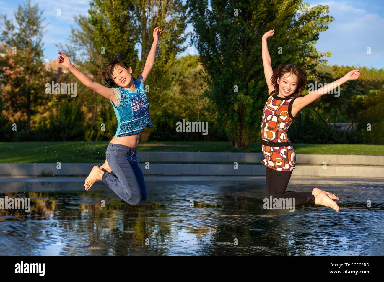 Japanese women jumping for hi-res stock photography and images - Alamy
