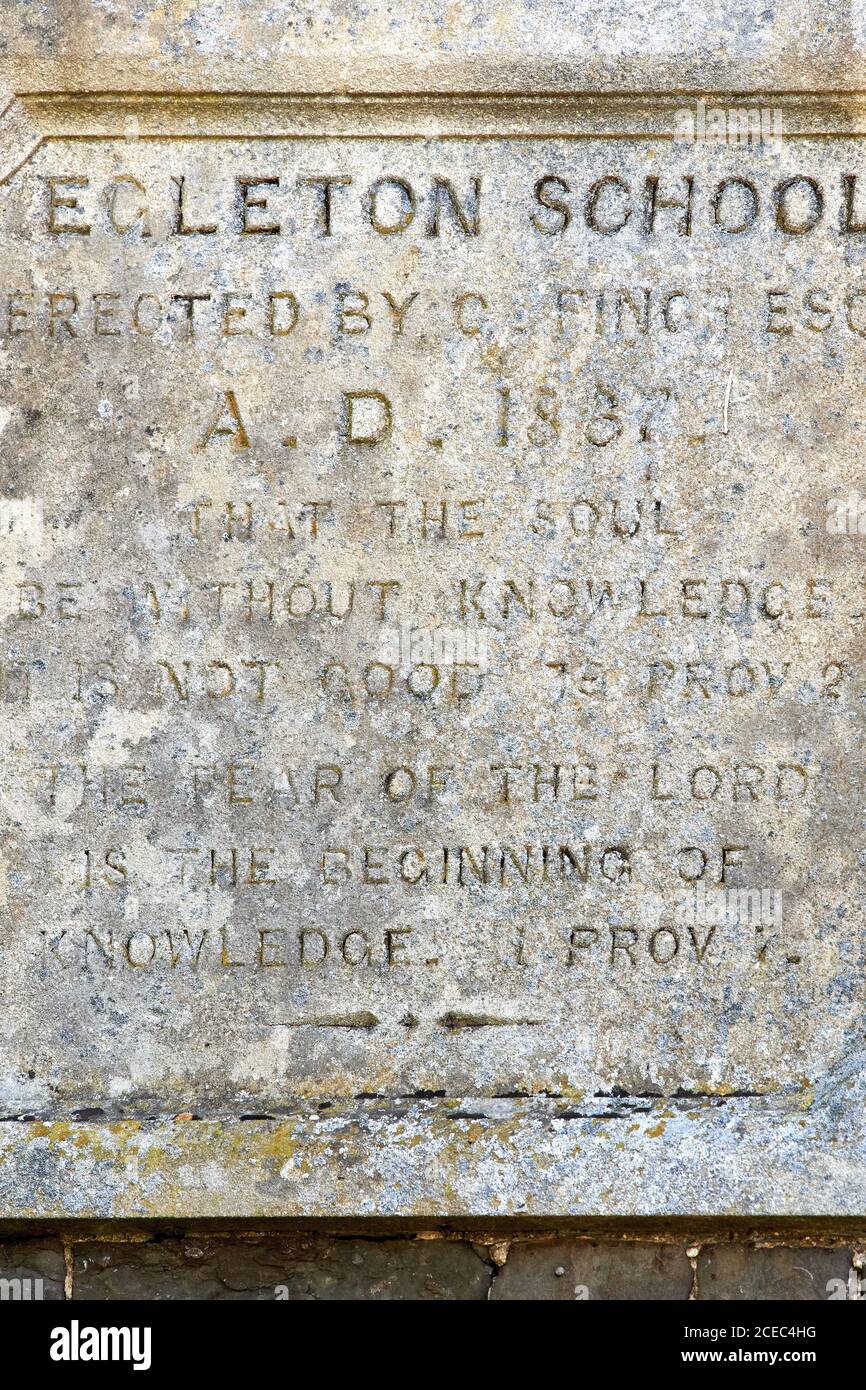 Stone inscription on the outside wall of the school at the village of ...