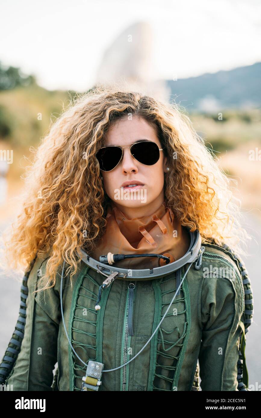 Beautiful Woman poses looking at camera dressed as an astronaut Stock ...