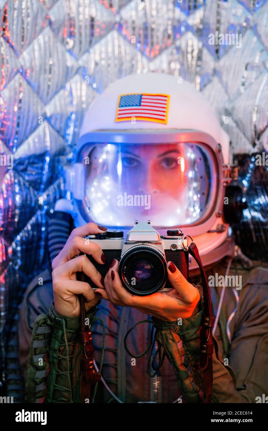 girl wearing old space helmet with camera Stock Photo - Alamy
