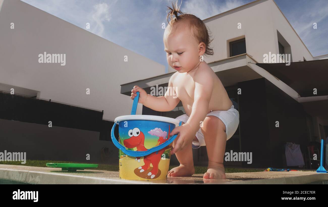 Bucket kid hi-res stock photography and images - Alamy